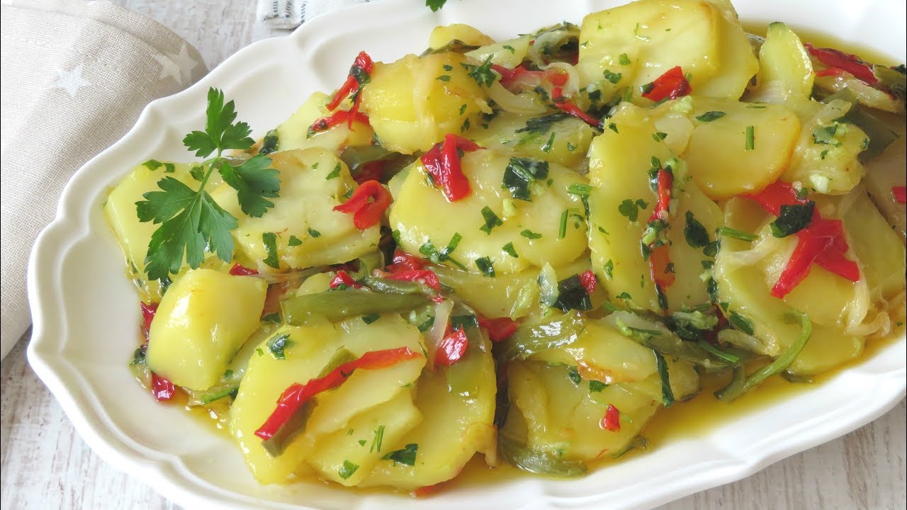 Patatas a lo pobre una receta que te llenará de emociones