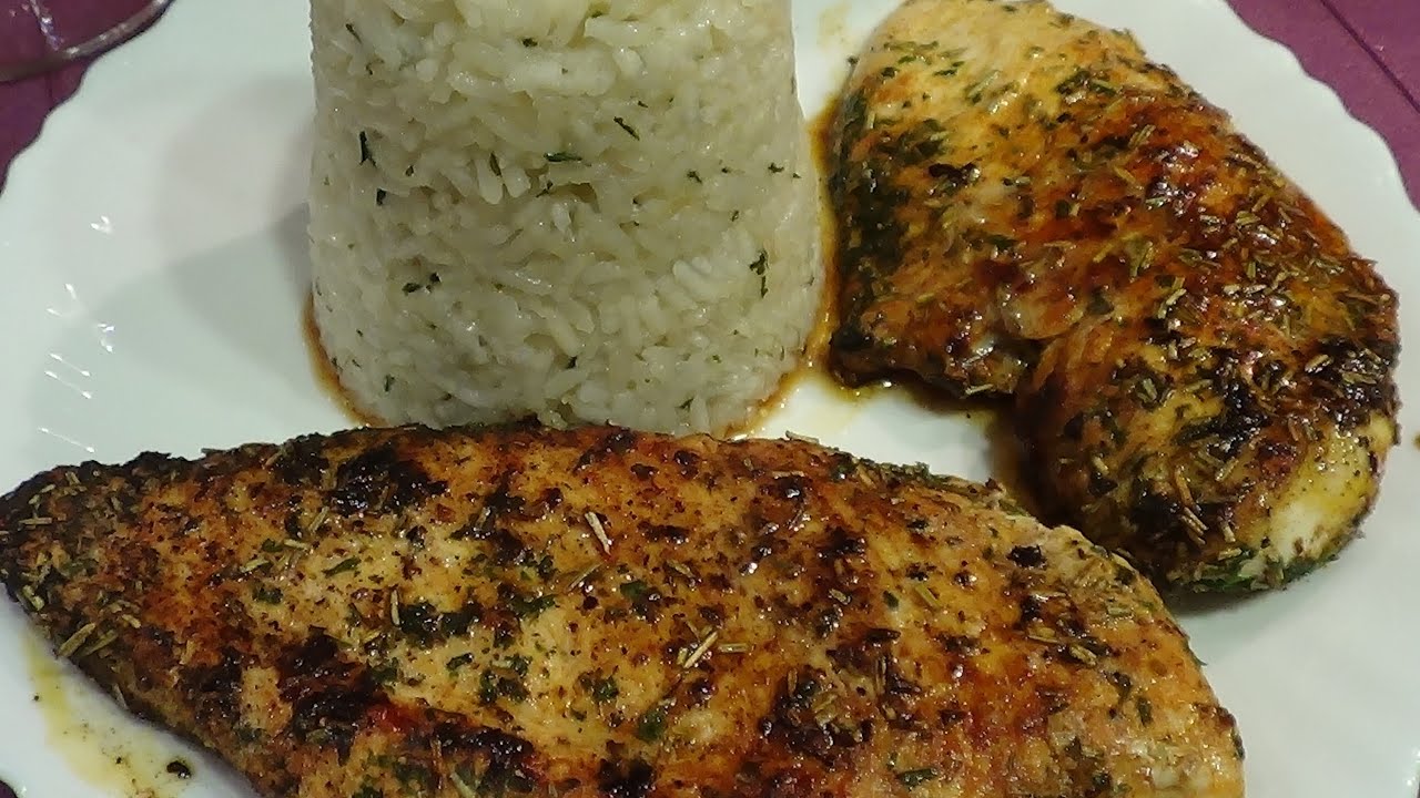 Pollo jugoso a la sarten acompañado con arroz